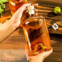 China Custom Color 750ml Transparent Round Wide Mouth Glass Liquor Bottle for Wine Vodka Gin for sale