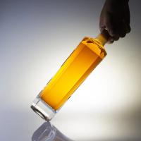 China Capacity 750ml Round Super Flint Glass Vodka Gin Rum Glass Bottle Weight for Whiskey for sale