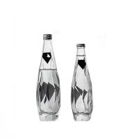China Transparent Rhombus Glass Bottle 350ml 500ml Custom Color Glass Collar Unique Design for sale