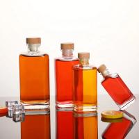 China Round Glass Liquor Wine Whisky Tequila Vodka Bottle with Cork 100ml 200ml 250ml 300ml for sale
