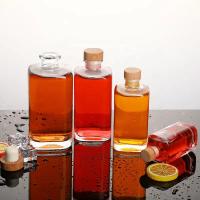 China Round Glass Liquor Wine Whisky Tequila Vodka Bottle with Cork 100ml 200ml 250ml 300ml for sale