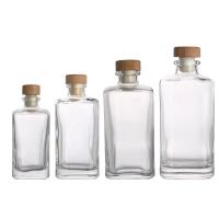 China Round Glass Liquor Wine Whisky Tequila Vodka Bottle with Cork 100ml 200ml 250ml 300ml for sale