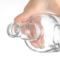 China Transparent Glass Products 500ml 750ml 1000ml Round Empty Tequila Bottle and Spray Cap for sale