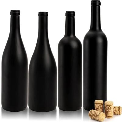 China Capacity 750ml Custom Empty Matte Coated Black Wine Bottle for Various Sizes of Wine for sale