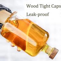 China 375ml Capacity Glass Bottle with Wooden Cap and Transparent Design for sale