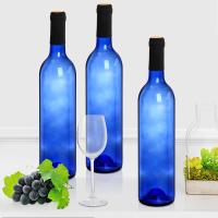 China 750ml Glass Bottles for Vodka Champagne Juice Beverages Decorations Cobalt Blue Round for sale