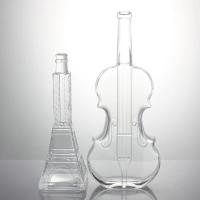 China Surface Handling Decal 500ml 750ml Round Extra Flint Whisky Vodka Brandy Glass Bottle for sale