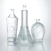 China Surface Handling Decal 500ml 750ml Round Extra Flint Whisky Vodka Brandy Glass Bottle for sale