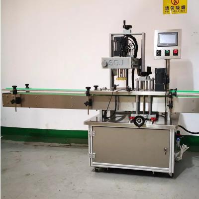 China Pneumatic Automatic Screw Capping Machine For Glass Plastic Bottle for sale