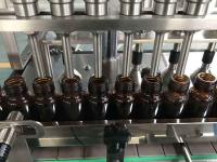 China 1000BPH Small Perfume Production Equipment Milk Bottle Filling Machine for sale