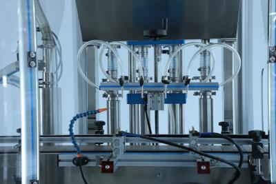 China 2.2KW 4 Heads Cosmetic Liquid Filling Machine 1400*1000*1700mm 30-50 Bottles / Min for sale