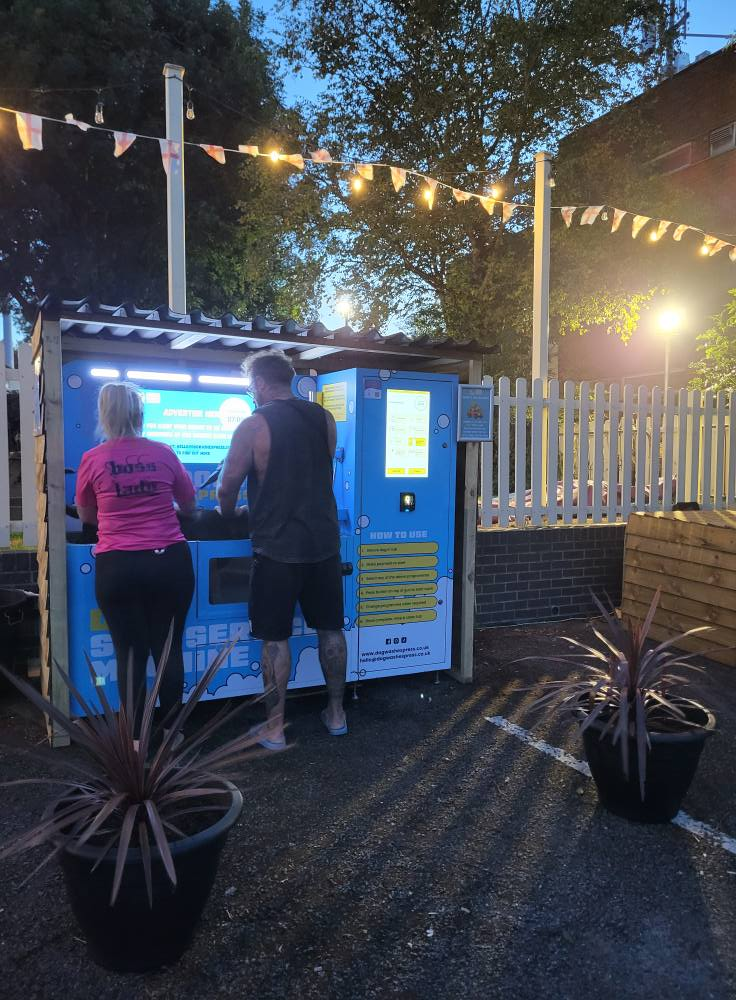 two customers are washing their dog