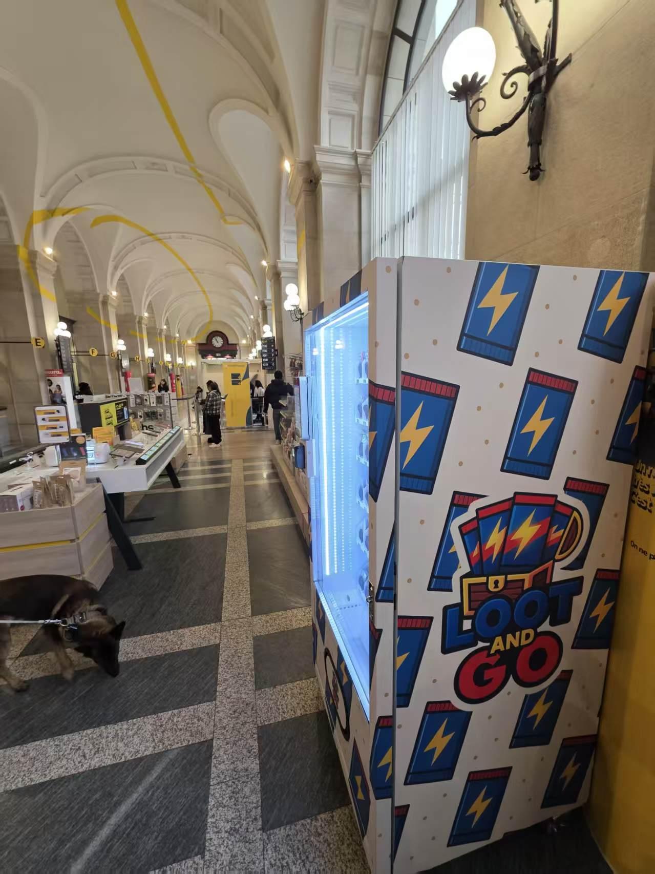 Our Swiss client use 10-inch touch screen to sell Pokemon card packs in train station.