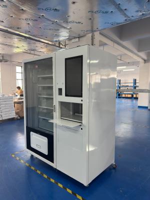 China Frozen Food Vending Machine with 3℃ Refrigeration Built-In Microwave Station and Waste Reduction Technology for sale