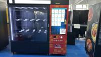 China Automated Clothes Vending Machine with 43-inch Touchscreen Compact Dimensions and XL Sweaters Hanging Slot for sale