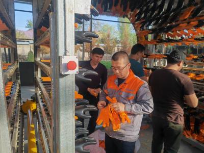 China Dipping Latex Glove Making Machine PLC Safety Gloves Making Machine for sale