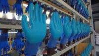 China PLC Rubber Gloves Manufacturing Machine 220V/380V Adjustable Temperature Range for sale