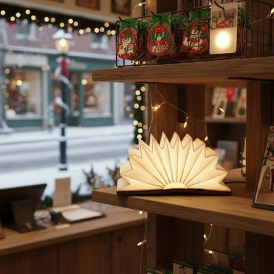 China Free Sample Mini Foldable Luminous Book Light Suction Creative Fridge Magnet Design Promotional Business Gift Souvenir Shop for sale