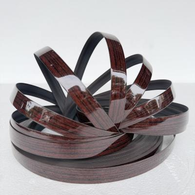 China High Gloss Red Sandalwood PVC Edge Banding for sale