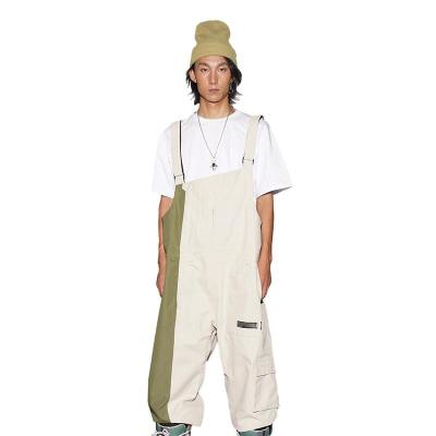 China Waterproof Winter Overalls Full Pressure Glue Contrast Color Work Pants Jacket 2 in 1 for sale