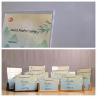 China Acrylic Photo Frame With Wood Base For Tabletop Display for sale