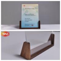 China High Definition Acrylic Photo Frame with Walnut Wood Base for sale