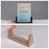 China A4 Clear Desktop Clear Acrylic Photo Frame with Wood Base for sale