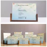 China Custom Family Acrylic Picture Frames With Wood Base for sale