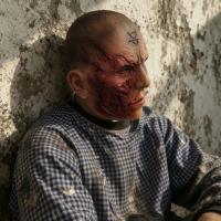 China Scarred Zombie Latex Mask with Symbol Tattoo - Lightweight 300g Halloween Horror Mask for sale