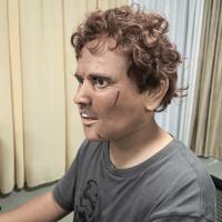 China Halloween Realistic Male Face Mask Battle Scarred Survivor Latex Headgear Creepy Cosplay Prop for Adult for sale