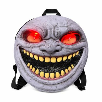 China Creepy Monster Face LED Backpack with Glowing Red Eyes, Realistic Cracked Stone Texture, Circular Halloween Cosplay Bag for Party, Trick-or-Treat, and Scary Costume Fans for sale