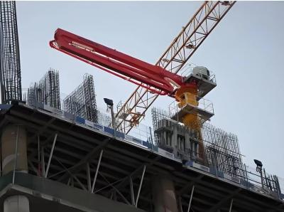 China Mobile Concrete Placement Boom Pump Machine 10720kg with 27.5-32m Radius and Panel/Wireless Control for sale
