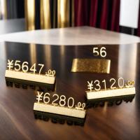 China Customizable Gold Metal Price Displays For Jewelry Watches And Luxury Goods for sale