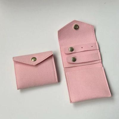 China Mini Pink Travel Jewelry Organizer Soft Microfiber Storage Bag for Easy Storage for sale