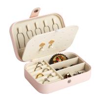 China Durable Pink Travel Jewelry Storage Box Compact and Secure Portable Storage for Necklaces Rings Earrings for sale
