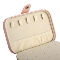 China Durable Pink Travel Jewelry Storage Box Compact and Secure Portable Storage for Necklaces Rings Earrings for sale