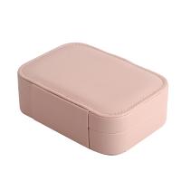 China Durable Pink Travel Jewelry Storage Box Compact and Secure Portable Storage for Necklaces Rings Earrings for sale