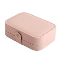China Durable Pink Travel Jewelry Storage Box Compact and Secure Portable Storage for Necklaces Rings Earrings for sale