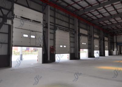 China Vertical Lift Industrial Sectional Door Windproof Multipurpose for sale