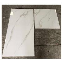 China Acid Resistant Full Body Porcelanato Polished 60x60 Tiles Gold Calacatta Marble for sale
