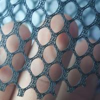 China Polyester Hexagonal Mesh Fabric 130gsm 1.55m Width for Bags Garments Laundry for sale