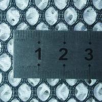 China Polyester Hexagonal Mesh Fabric 130gsm 1.55m Width for Bags Garments Laundry for sale