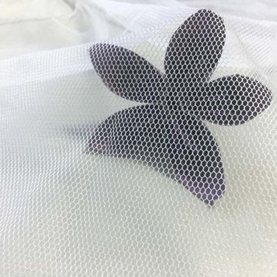 China 100% Polyester Hexagonal Mosquito Net Fabric 90gsm 1.6m Width for Wedding Dress Sportswear for sale