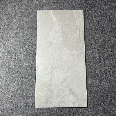 China 1200x600 Textured Wall Tiles Living Room Wear Resistant Semi Matt Gray Wabi Sabi Rustic for sale