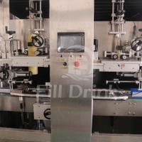China Steam Generator Bottle Labeling Equipment Double Head Sleeve Labeling Machine for sale