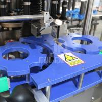 China 9000BPH OPP Hot Melt Bottle Label Sticking Machine Full Automatic 9 Heads Rotary for sale