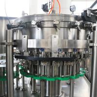 China 4000BPH SUS304 PET Carbonated Bottling Machine With Air Conveyor for sale