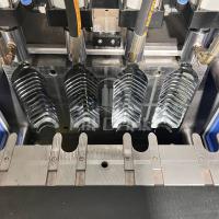 China 4 Cavity 1500BPH Semi Automatic PET Blow Molding Machine With PLC Screen for sale