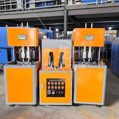 China Beverage Bottle Blowing Machine 1+1 2 Cavity 500ml-2L Semi Automatic for sale