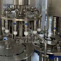 China 2L Automatic Juice Bottle Filling Machine 4000BPH Back Flow Tank for sale